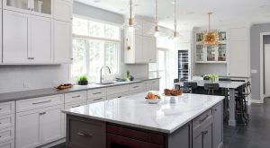 White Kitchen with Red Statement Range : Normandy Remodeling